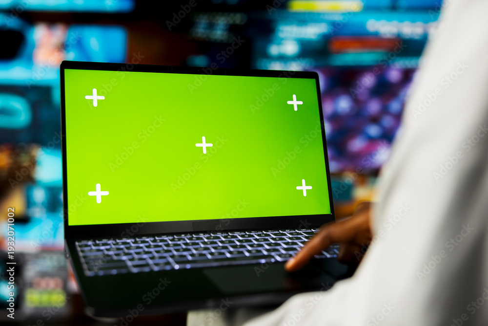 Healthcare professional using mockup laptop, reviewing CT scans and MRI ...