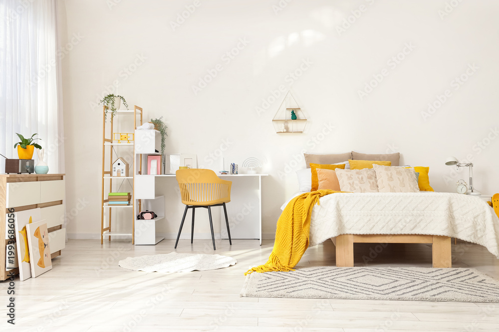 Interior of light children's room with bed and study table の Stock フォト ...