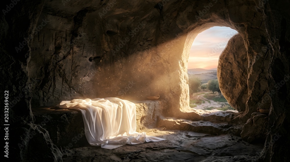Stock-Foto „Dramatic light shining into empty stone tomb with discarded ...