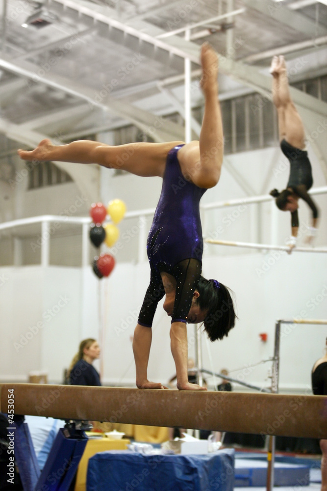 gymnast competing on beam Stock Photo | Adobe Stock