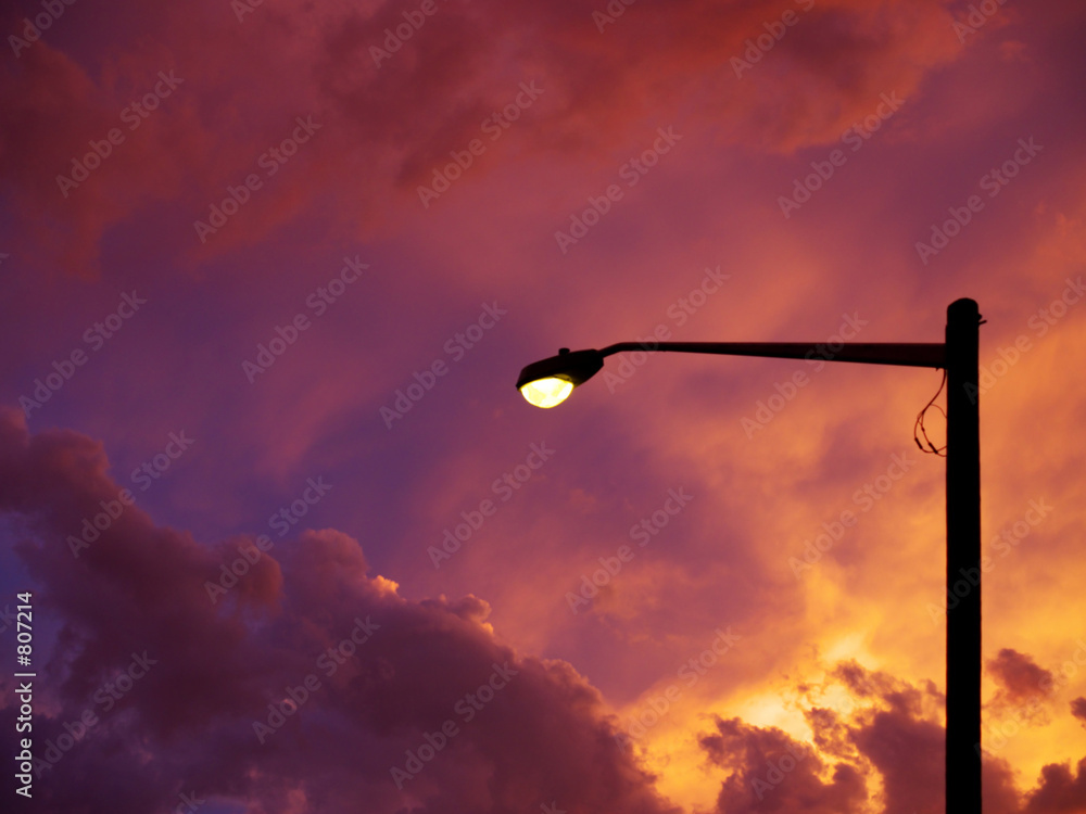 lamp post in silhouette against sunset Stock Photo | Adobe Stock