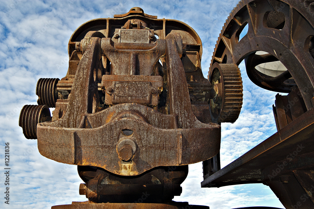 rusted industrial geared machine with sky Stock Photo | Adobe Stock