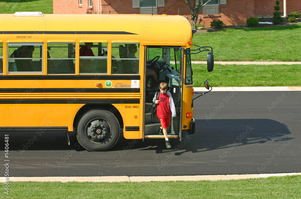 boy getting off bus Stock Photo | Adobe Stock