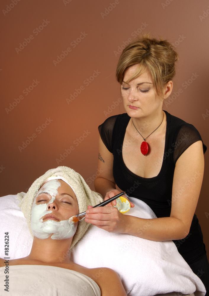 spa esthetician applying organic facial masque Stock Photo | Adobe Stock