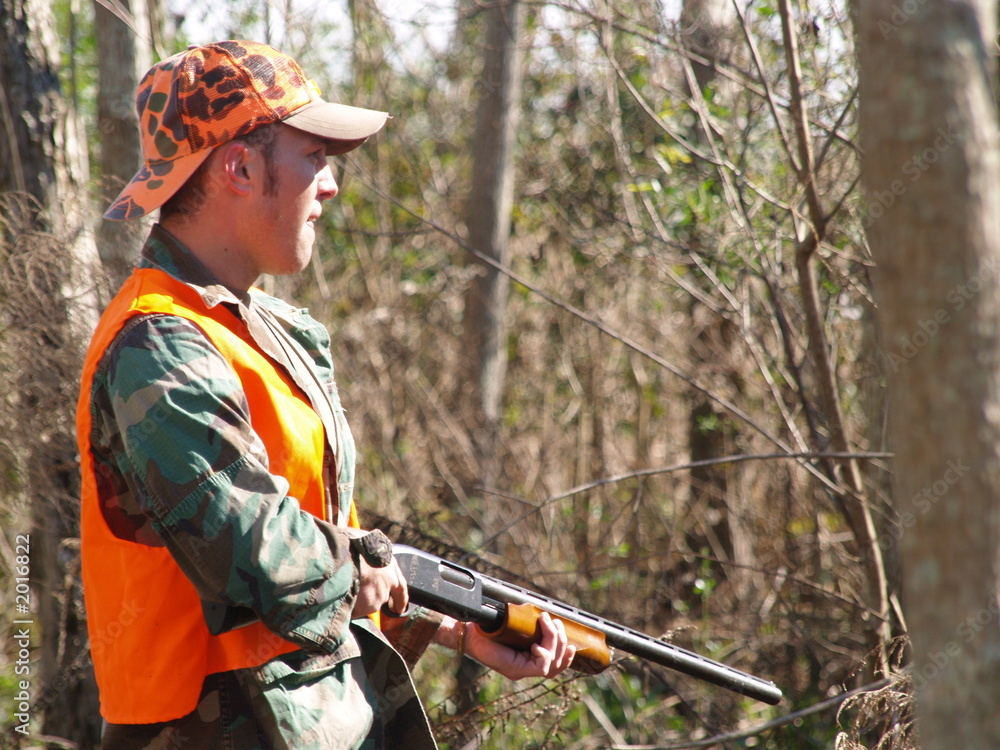 man hunting in the woods Stock Photo | Adobe Stock