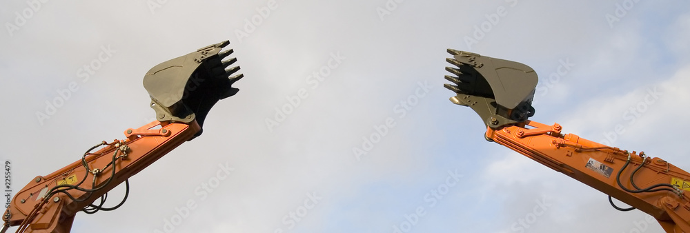 two shovels of excavators Stock Photo | Adobe Stock