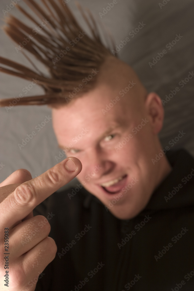 punk male with one finger salute! Stock Photo | Adobe Stock