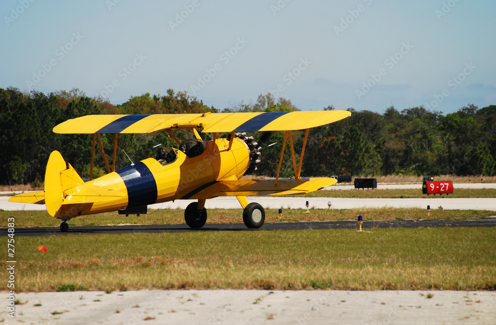 vintage yellow biplane Stock Photo | Adobe Stock
