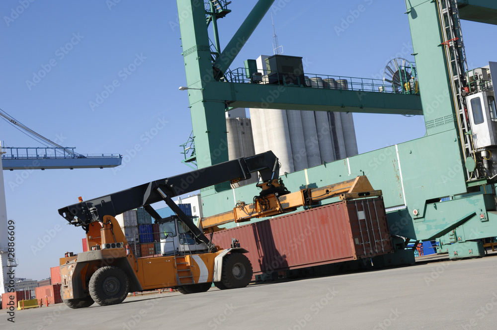 container-truck lifting container Stock Photo | Adobe Stock