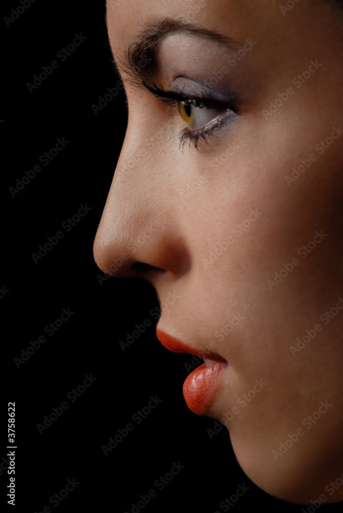 Side-view of thinking woman with red lips Stock Photo | Adobe Stock