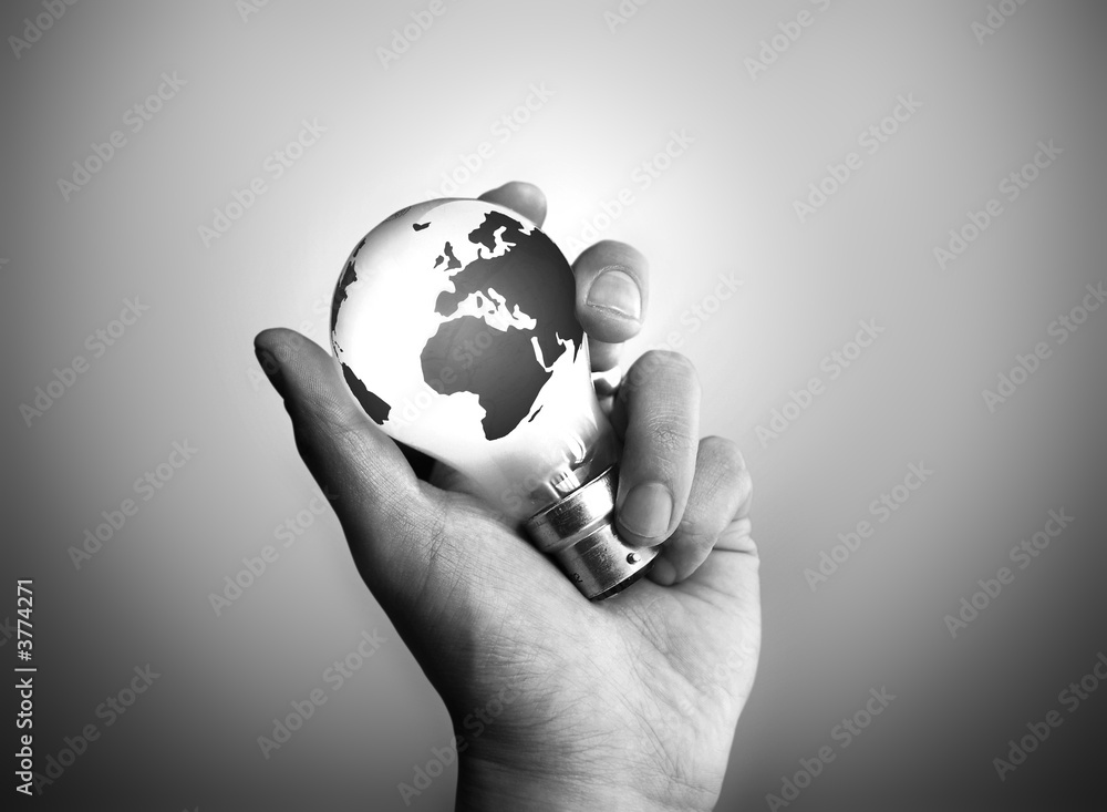 A man holding the world in his hands. Stock Photo | Adobe Stock