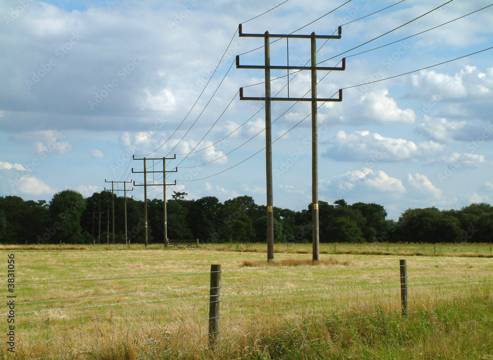 Overhead Power Lines in rural setting Stock Photo | Adobe Stock