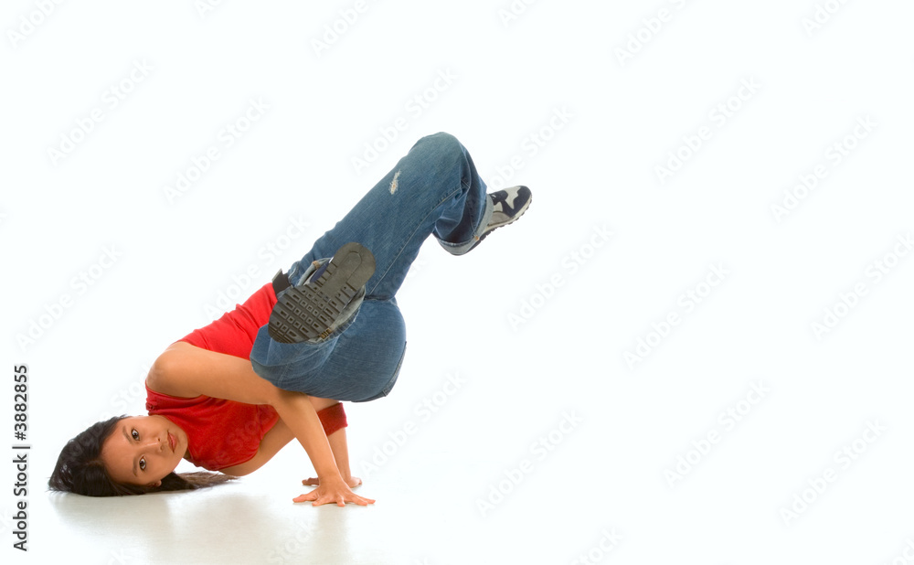 Break dancing girl in complex pose foto de Stock | Adobe Stock