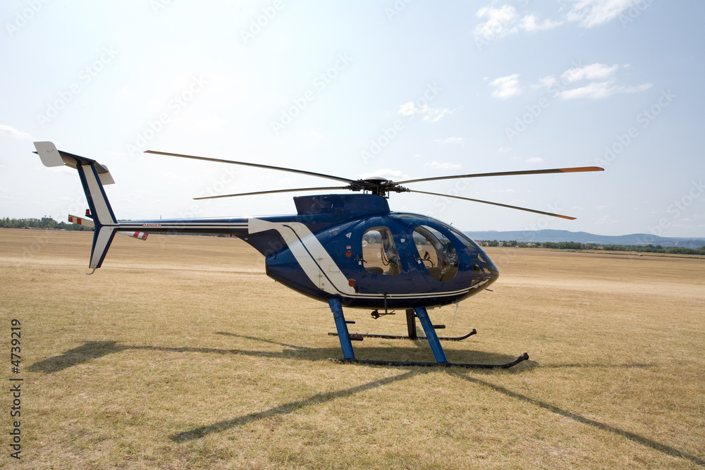 blue helicopter on the ground Stock Photo | Adobe Stock