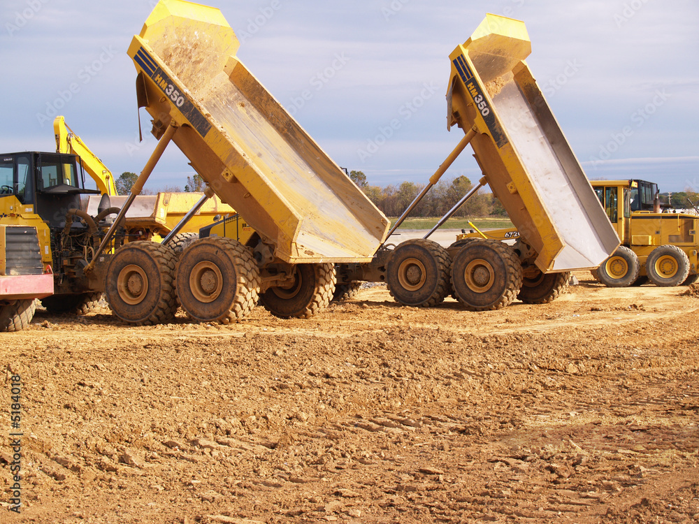 two dump trucks at construction site Stock Photo | Adobe Stock