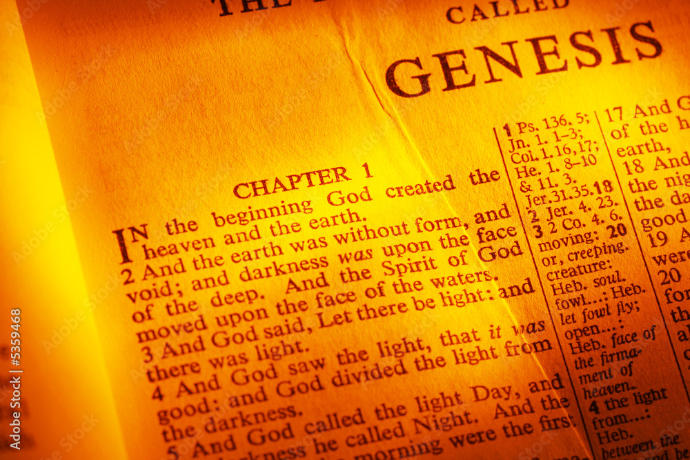 Holy Bible open to Genesis, Chapter 1. Warm tones. Stock Photo | Adobe ...