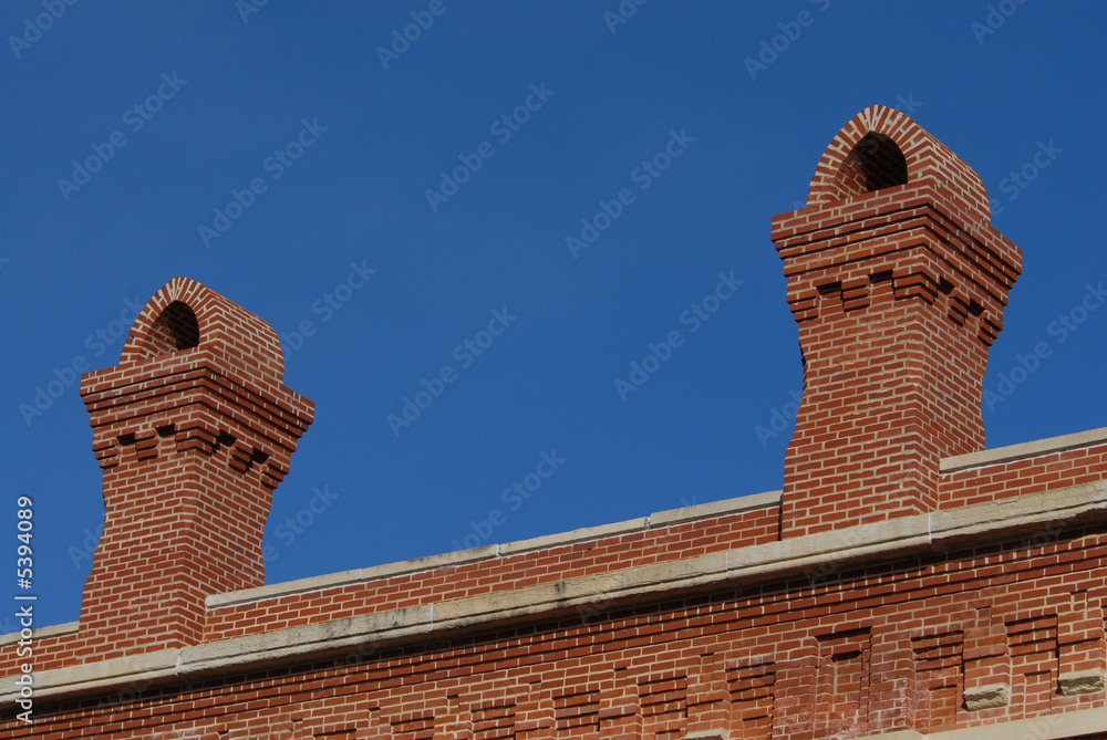 Two Brick Chimney Caps Stock Photo | Adobe Stock