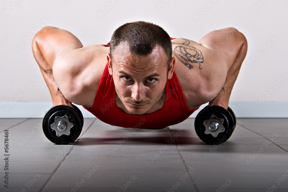 Push up with dumbbells, classic endurance exercise for biceps Stock ...