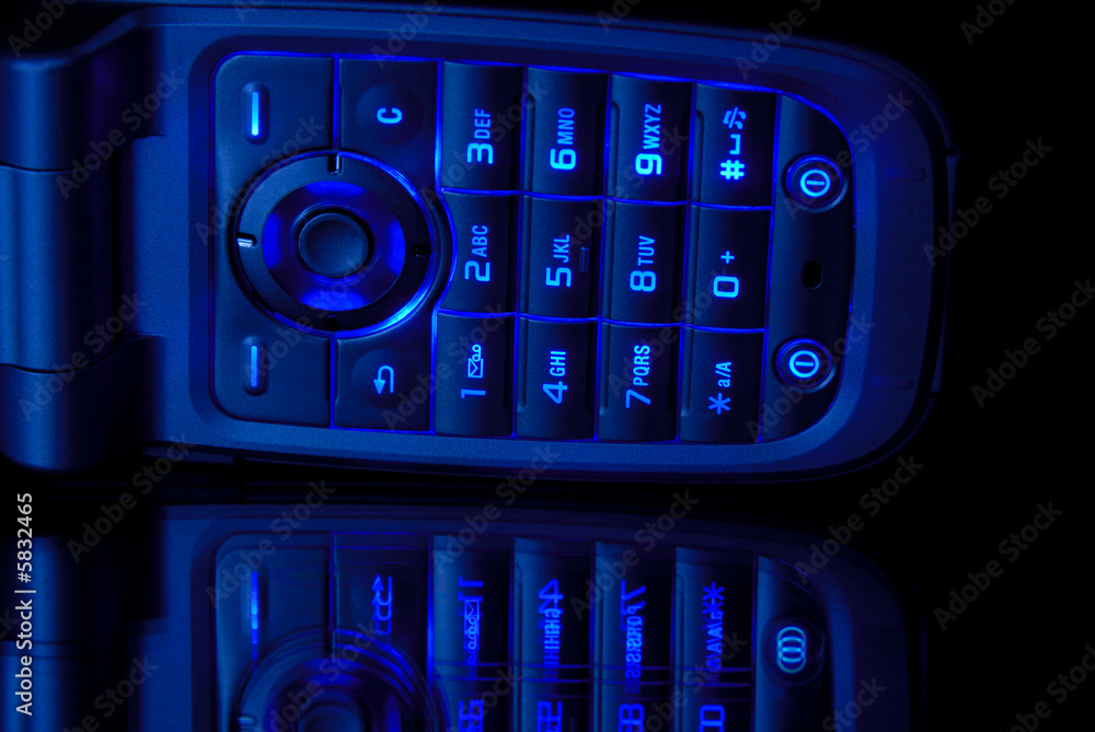 Abstract blue cell phone reflected on multi-layered clear glass. Stock ...