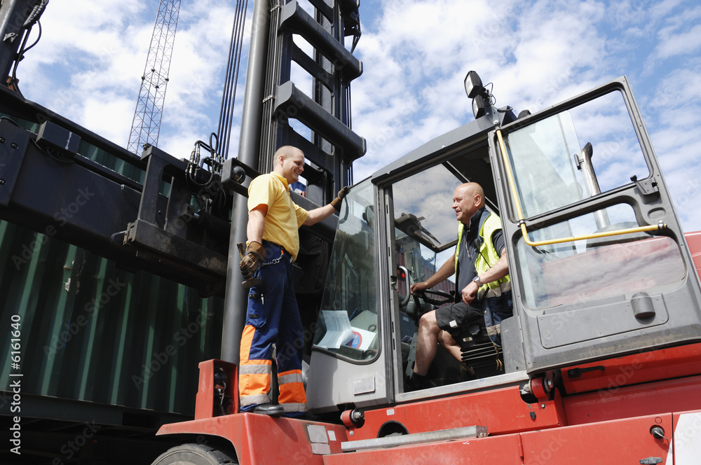 forklift inside container port Stock Photo | Adobe Stock