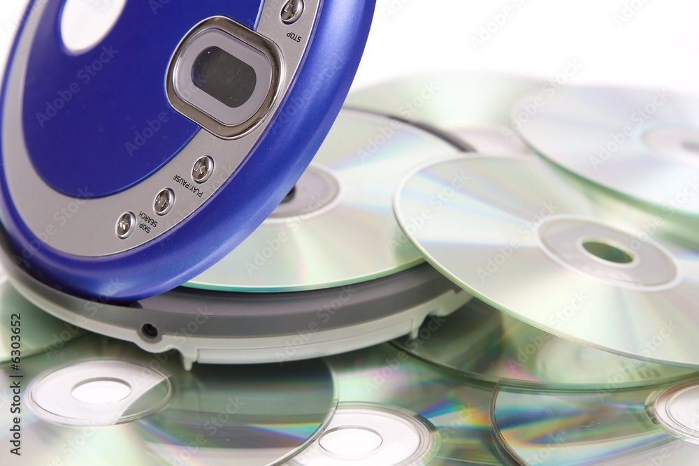 Compact discs and round blue cd player Stock Photo | Adobe Stock