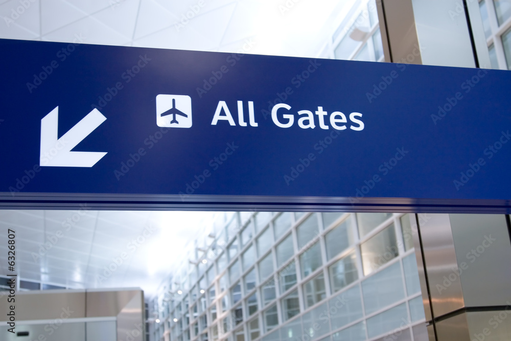Direction signs in an airport terminal for travelers Stock Photo ...