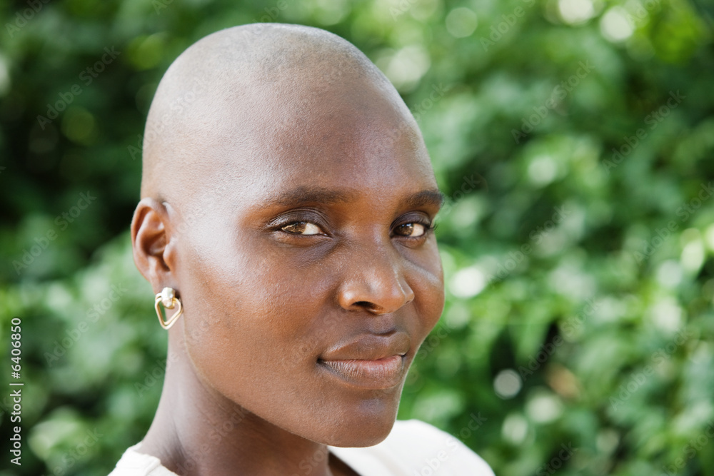 Bald and beautiful typical African woman. Stock Photo | Adobe Stock