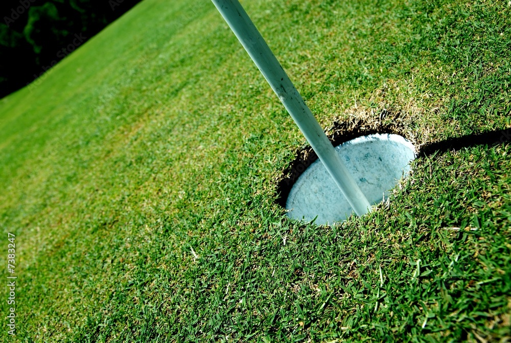 Golf course hole on green Stock Photo | Adobe Stock