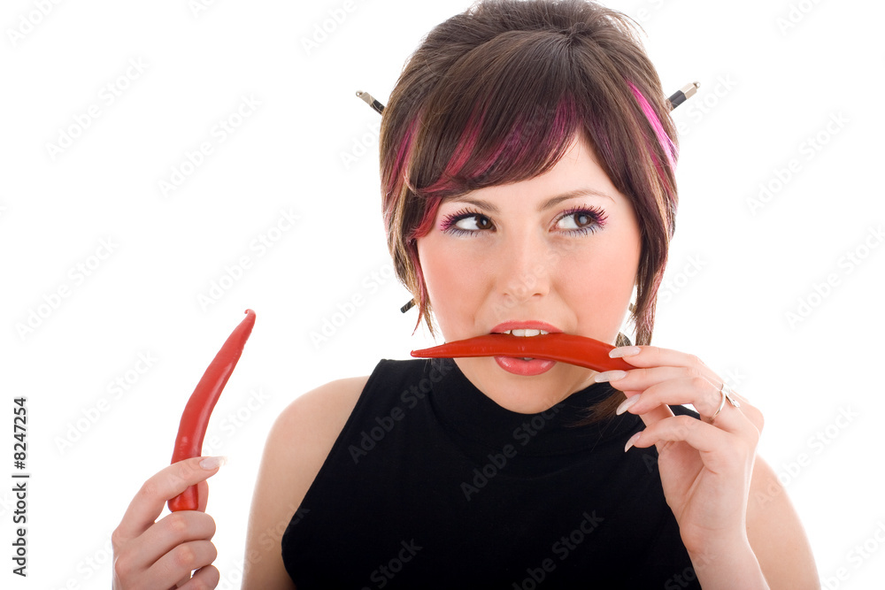 Sexy hot woman biting chilli peppers Stock Photo | Adobe Stock