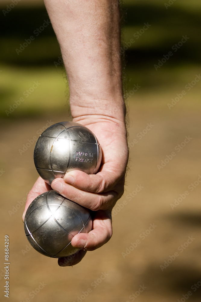 main tenant des boules de pétanque Stock Photo | Adobe Stock