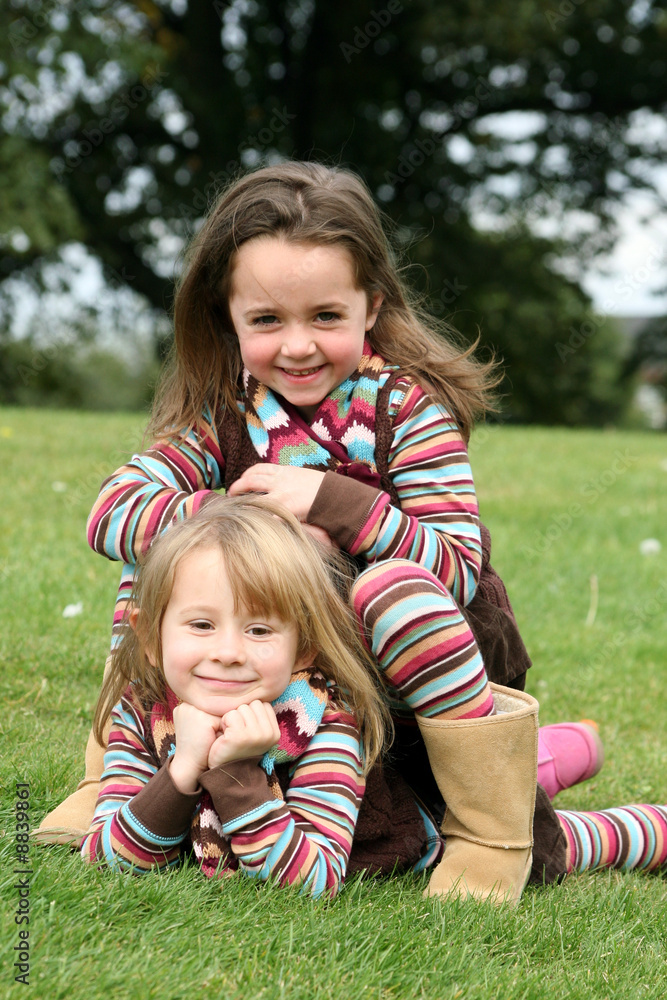 Two sisters together Stock Photo | Adobe Stock