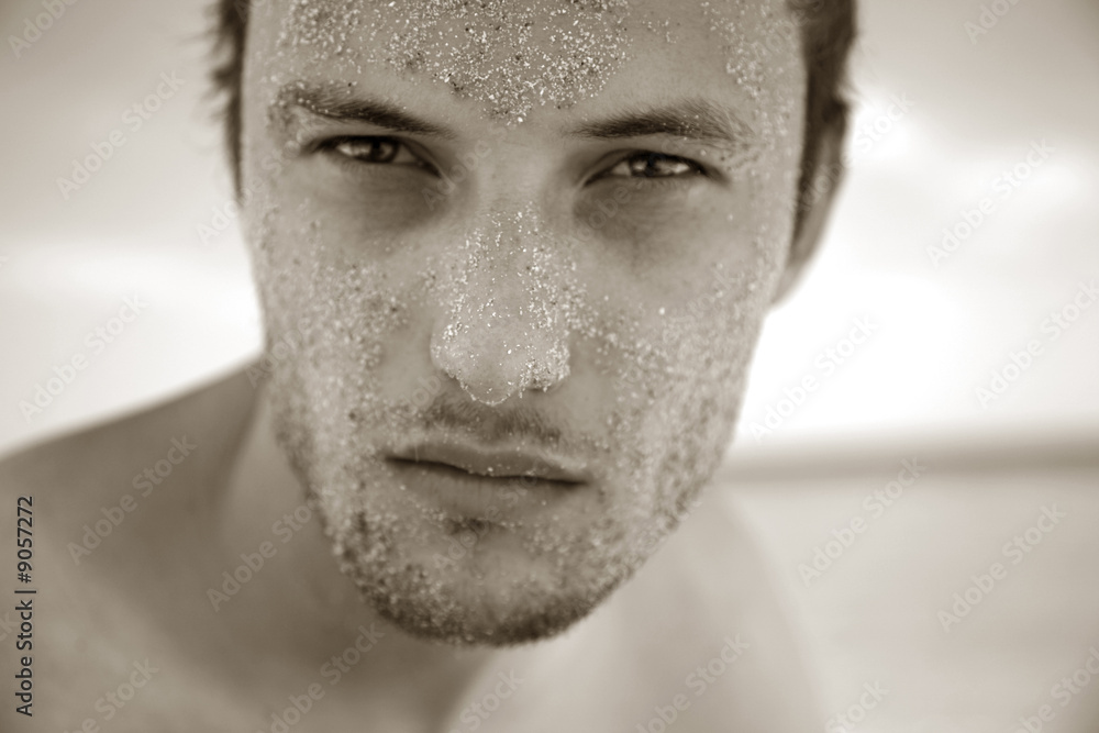 Portrait courageous man with sand on Face Stock Photo | Adobe Stock