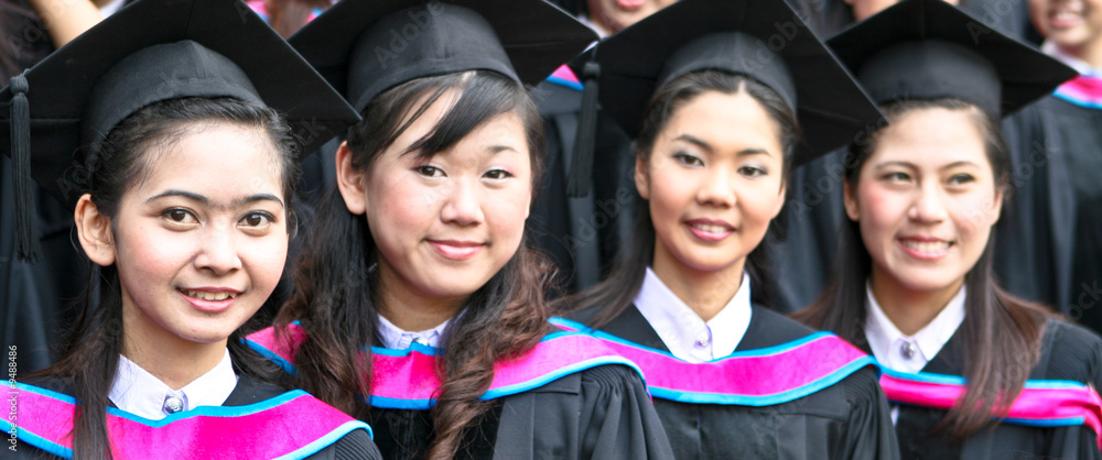 Beautiful Asian university graduates celebrate their success. Stock ...