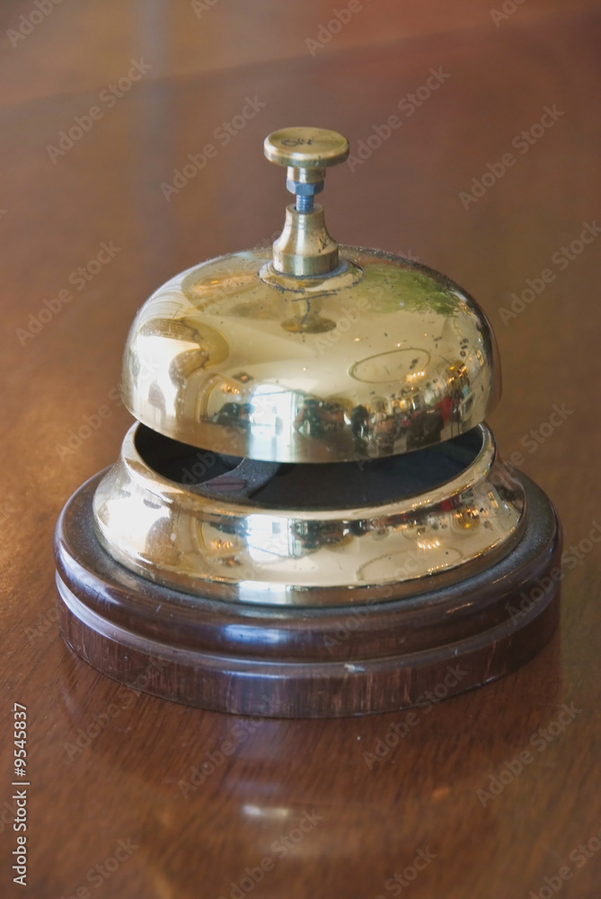 bell on bellman stand in hotel lobby Stock Photo | Adobe Stock