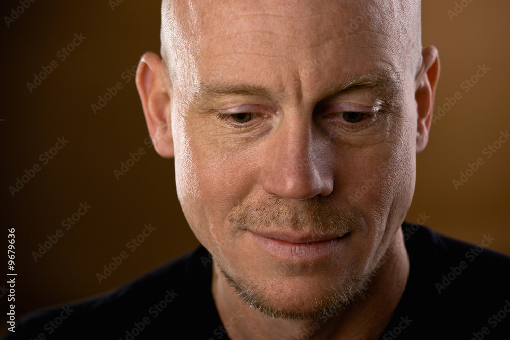 Studio shot of bald man with goatee and mustache Stock Photo | Adobe Stock