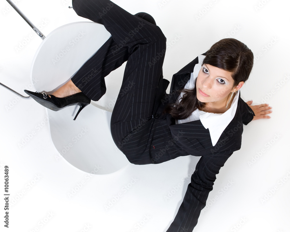 Frau und Stuhl liegen am Boden Stock-Foto | Adobe Stock