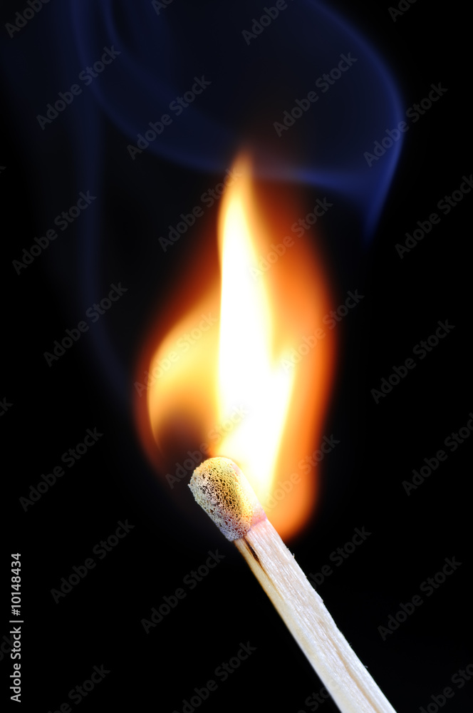 Burning fire of match on black background with blue smoke Stock Photo ...