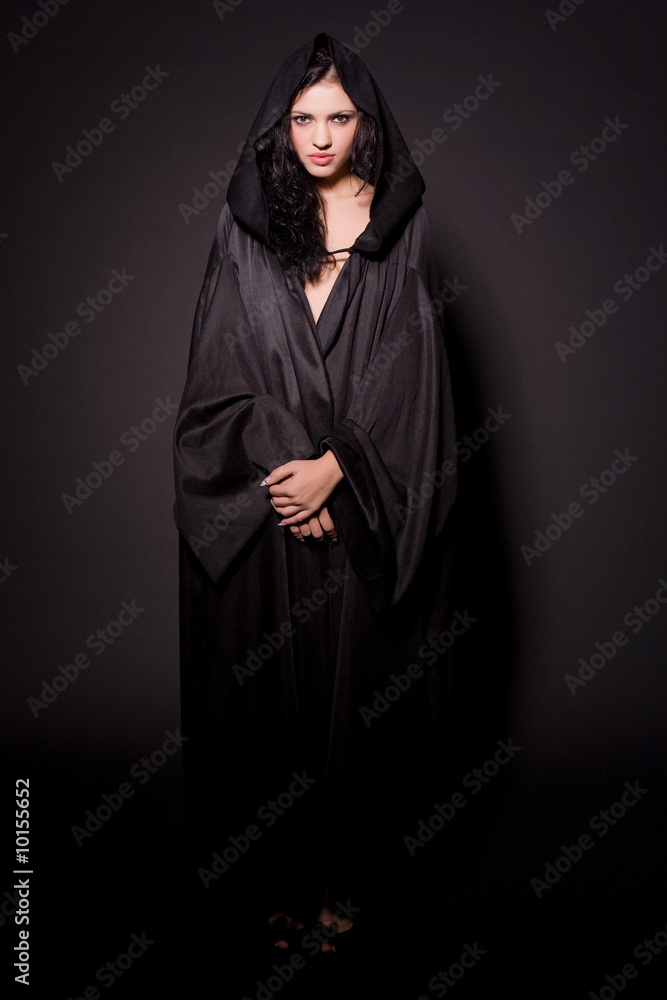 Beautiful girl in nun outfit, isolated on black background Stock Photo ...