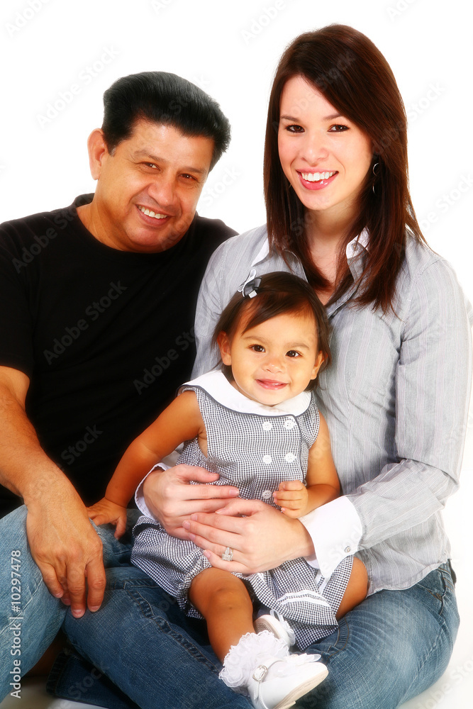 Happy Hispanic couple with child over white background. Stock Photo ... Happy Hispanic couple with child over white background. Stock Photo ...
