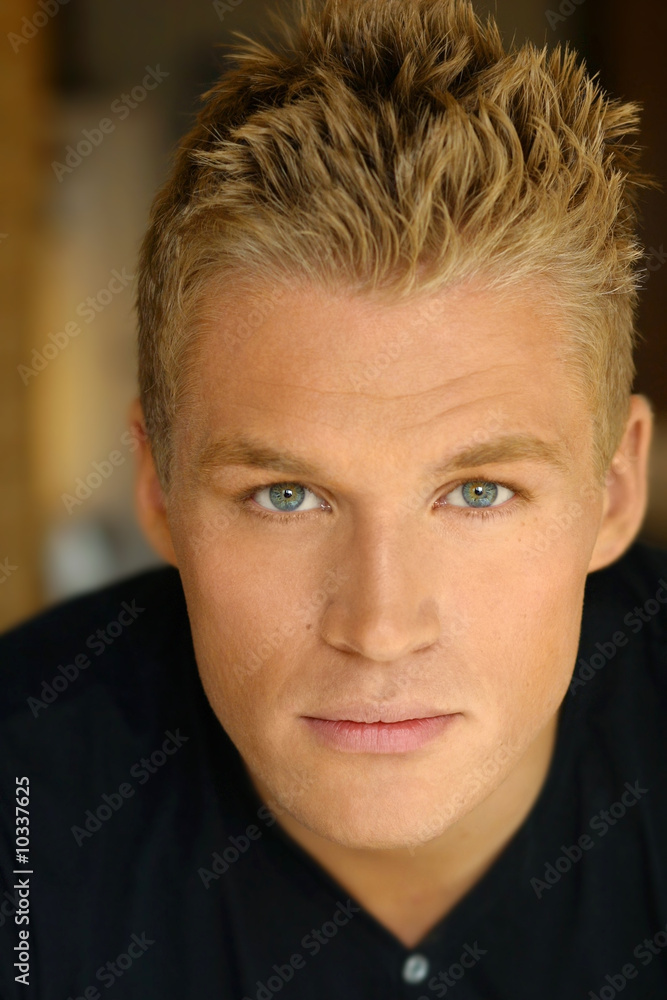 Close-up portrait of young male model in black shirt.. Stock Photo ...