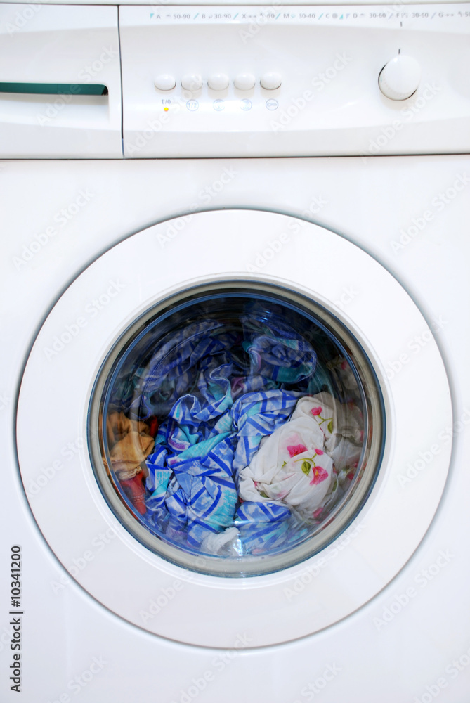 clothing in washing machine Stock Photo | Adobe Stock
