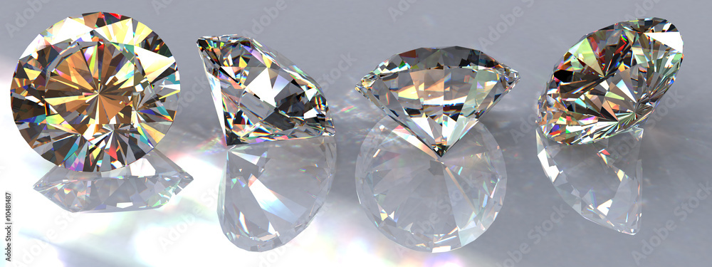 Four brilliant cut clear diamonds Stock Photo | Adobe Stock