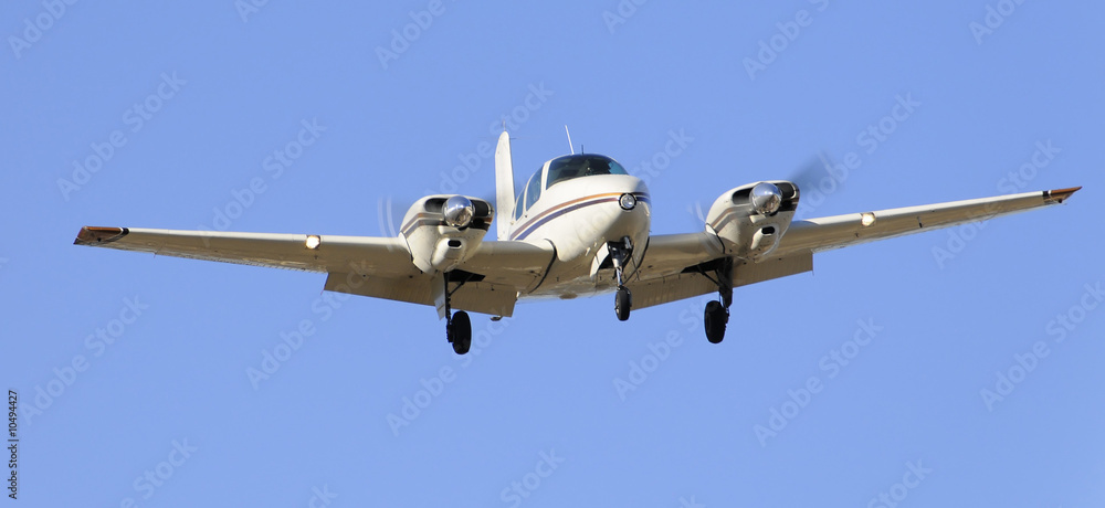Airplane in Glide Path Stock Photo | Adobe Stock