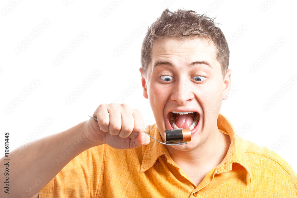 mad man eating battery Stock-Foto | Adobe Stock