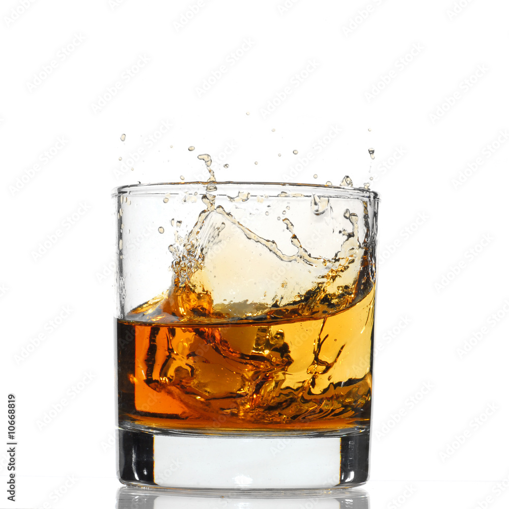 Whiskey splash Stock Photo | Adobe Stock