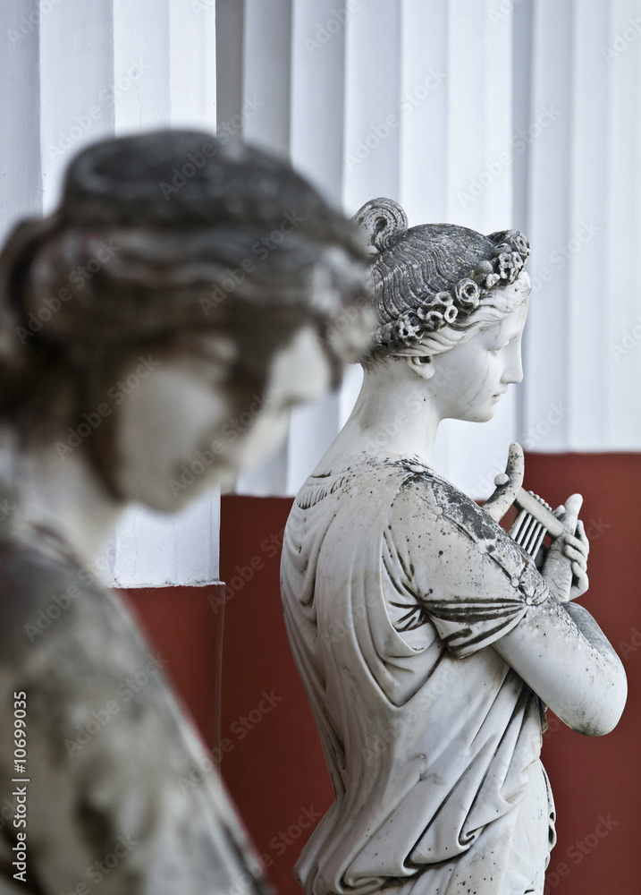 Statue on black background showing Greek mythical muses Stock Photo ...