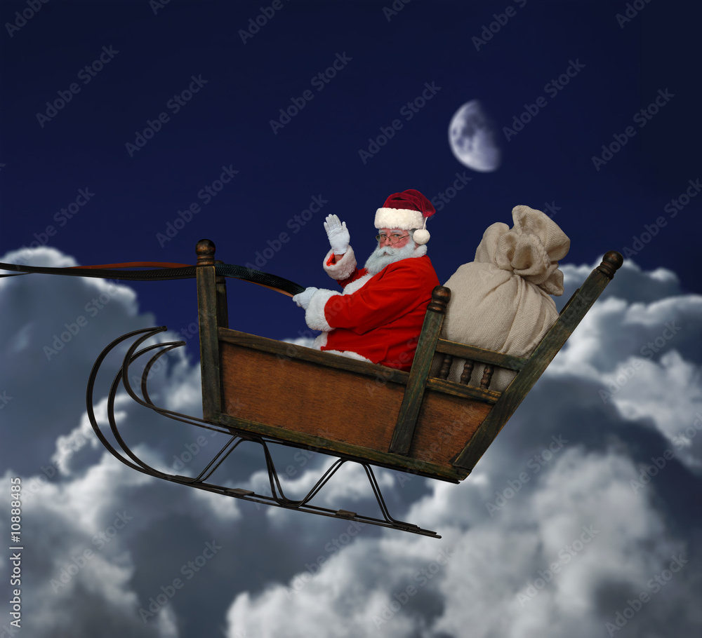Santa in Flight Stock Photo | Adobe Stock