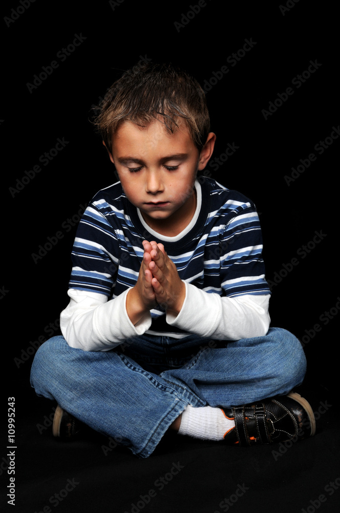 Young Boy Praying Stock Photo | Adobe Stock