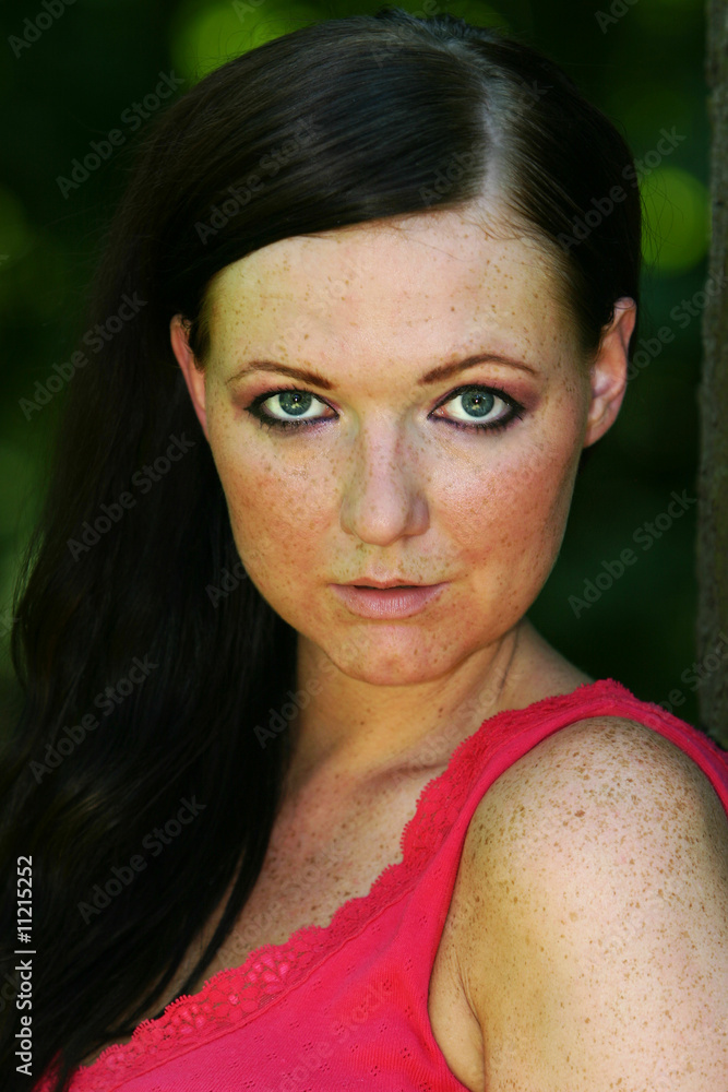 german girl with freckles and long black hair and blue eyes Stock Photo ...