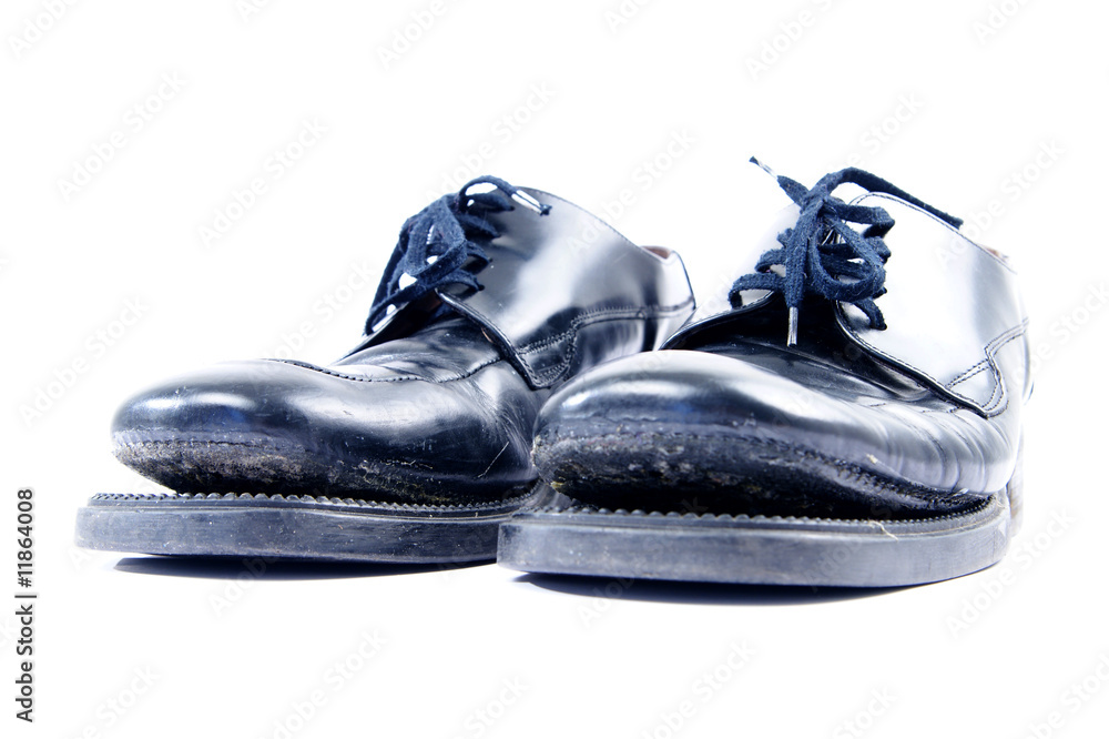 Foto Stock scarpe rotte | Adobe Stock